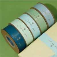 China Custom Polyester Ribbon Spool With 3D Gold Foil And Printed Logo for sale