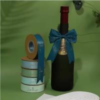 China Custom Polyester Ribbon Spool With 3D Gold Foil And Printed Logo for sale