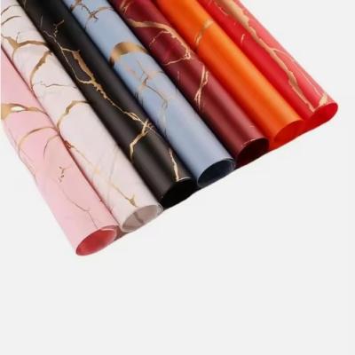 China wholesale gold marbling flower wrapping paper waterproof Floral materials gift wrapping for sale