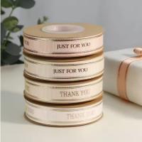 China Customized Polyester Gold Foil Branded Ribbon with 3D Logo for Christmas and Birthday for sale