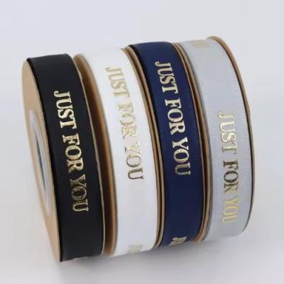 China Polyester Tuff Printed Ribbon Roll Double Solid Color Eco-friendly Gold Foil Logo for sale