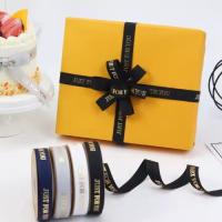 China Polyester Tuff Printed Ribbon Roll Double Solid Color Eco-friendly Gold Foil Logo for sale