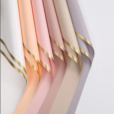 China 2024 Gold Edge Plastic Flower Wrapping Paper Multicolor Waterproof Thicken for Fresh Flower for sale