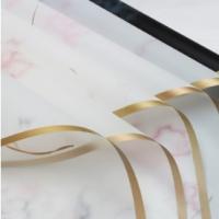 China Gold Edge Marble Flower Wrapping Paper Border Plastic Opp Film Wrapping Paper Wholesale for sale
