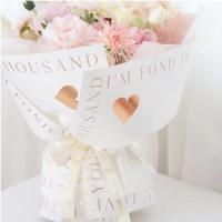 China DIY Handmade Gifts Mutiple Color Gold Stamping True Heart Flower Wrapping Paper Waterproof Plastic Paper For Flower Shop for sale