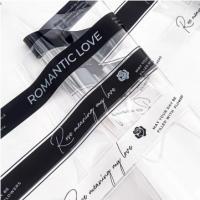 China Lizhiran Internet Celebrity Romantic English Opp Waterproof Simple Cellophane Bouquet Wrapping Paper Flower Packaging for sale