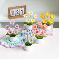 China Finished hand-woven lily of the valley potted home decoration knitted artificial flower wool crochet bouquet artificial flower gift for sale