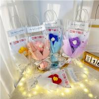 China Finished Transparent Light Packaging Bag Plush Flowers Bouquet Variety Dolls In Large Puff Bouquet For Women's Day Gift for sale