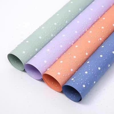 China Waterproof Double-Sided Polka Dot Bouquet Wrapping Paper for Ouya Paper Flower Packaging in 58CM * 58CM Customized Size for sale