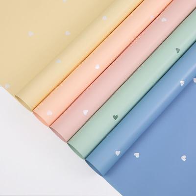 China Valentine's Day Heart-Print Oya Paper Waterproof Solid Color Floral Wrapping Paper for Bouquets Florist Grade 56cm*56cm Customized for sale