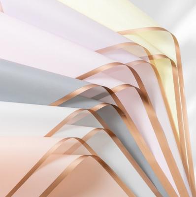 China Gold-edge jelly film wrapped flower paper, thickened Valentine's Day flower wrapping paper, diy waterproof matte paper bouquet wrapping paper for sale