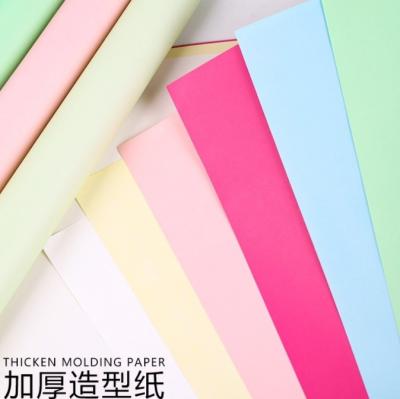 China Fenghua Artistic shaped paper flower packaging paper, thickened 157g cowhide material flower shop flower packaging material for sale