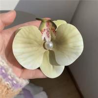 China Hot Selling Artificial Floral Orchid Hairpins Flower Hair Clip Seaside Vacation Hair Accessories for sale