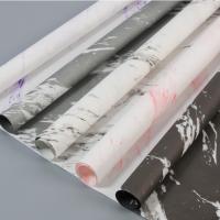 China The manufacturer wholesales Valentine's Day white marble-patterned flower bouquets, wrapping paper gifts, and DIY packaging gifts for flower shops for sale