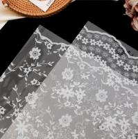 China Yitong imitation lace lace transparent cellophane bouquet waterproof flower wrapping paper opp plastic flower wrapping material for sale