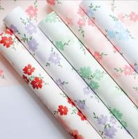 China Spring floral packaging paper, thickened fresh flower bouquet packaging paper, waterproof printed packaging paper, flower shop floral art packaging for sale