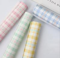 China Two-color checkered retro Ouya paper-wrapped flower paper checkered gift flower packaging bouquet wrapping paper wholesale materials for sale