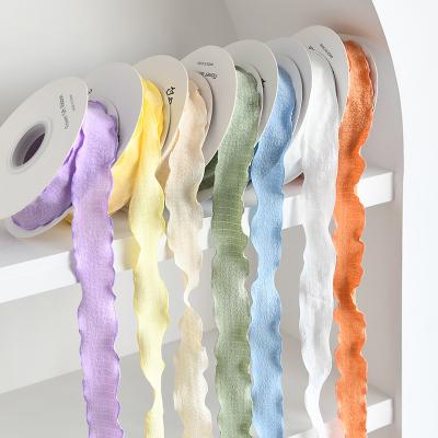China 2.5cm pleated wave yarn floral ribbon fishtail yarn wrapped flower ribbon ribbon snow yarn chiffon ribbon ribbon for sale
