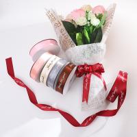 China Spot flower packaging, ribbon, silk tape, polyester tape, printed English gift box packaging, bouquet wrapping material, tape for sale