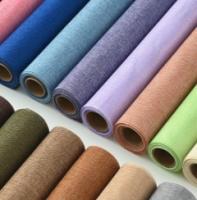 China New Exquisite Color Linen Roll Flower Packaging Paper for sale