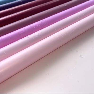 China Ouya paper double-sided double-color waterproof flower wrapping paper gift diy bouquet packaging material wholesale flower wrapping paper for sale
