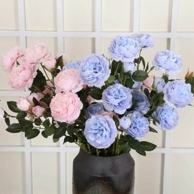 China The hotel living room is decorated with flower arrangements featuring artificial peonies for sale