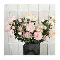 China The hotel living room is decorated with flower arrangements featuring artificial peonies for sale