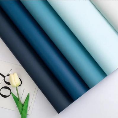 China New product: Watercolor Flower Island Korean-style flower wrapping paper, waterproof pearlescent film, flower shop bouquet wrapping paper material wholesale for sale