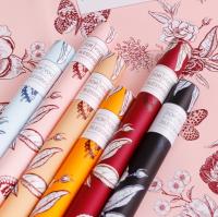 China New butterfly flowering period flower wrapping paper, bouquet material, waterproof floral art packaging, paper for Women's Day bouquets for sale
