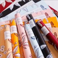 China New butterfly flowering period flower wrapping paper, bouquet material, waterproof floral art packaging, paper for Women's Day bouquets for sale
