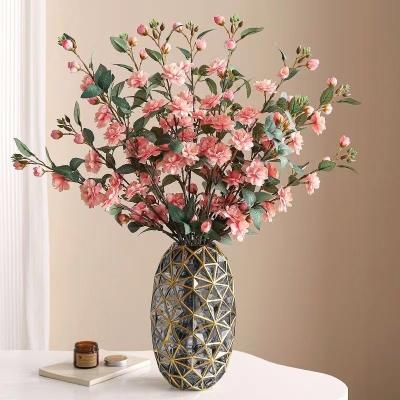 China Camellia artificial flowers, multi-headed camellia flower arrangements, long branches, artificial flowers, home decoration for sale