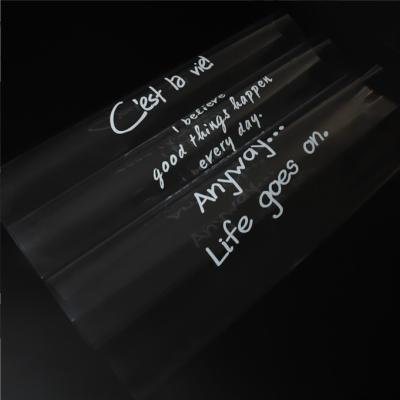 China 20 thickened OPPs of the popular dust-proof water transparent flower wrapping paper with English letters and glass paper for rose bouquets for sale