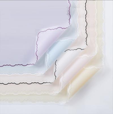 China New handkerchiefs are waterproof jelly film flower wrapping paper materials for strawberry bouquets and fresh flowers for sale