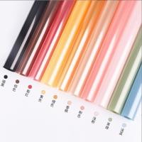 China Colored cellophane, new transparent bouquet wrapping paper, OPP film, jelly film, waterproof flower art wrapping paper for sale