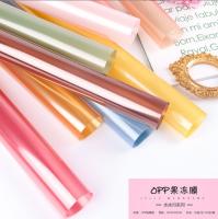 China Colored cellophane, new transparent bouquet wrapping paper, OPP film, jelly film, waterproof flower art wrapping paper for sale