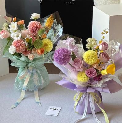 China Flower Love, People's Day, small lace, cellophane, lace border, waterbag, flower paper, flower shop, popular bouquet packaging material for sale