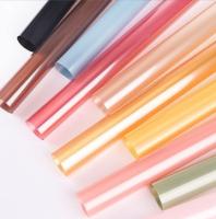 China Colored cellophane OPP jelly film packaging paper, flower wrapping paper, bouquet packaging materials, waterproof flower shop materials for sale