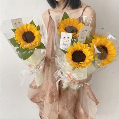 China Teachers' Day English transparent opp plastic waterproof cellophane flower packaging material Sunflower bouquet wrapping paper for sale