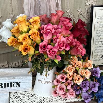 China Simulated 7-head artificial fake silk bouquet with high-end feeling for weddings, decorative flower arrangement in living rooms, plastic roses for sale