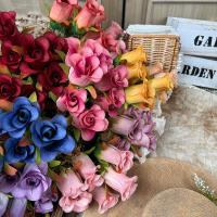 China Simulated 7-head artificial fake silk bouquet with high-end feeling for weddings, decorative flower arrangement in living rooms, plastic roses for sale