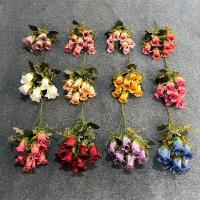 China Simulated 7-head artificial fake silk bouquet with high-end feeling for weddings, decorative flower arrangement in living rooms, plastic roses for sale