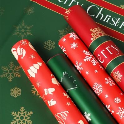 China Christmas flower wrapping paper, Christmas Eve apple bouquet wrapping paper, waterproof snowflake cellophane, Ouya paper gifts for sale