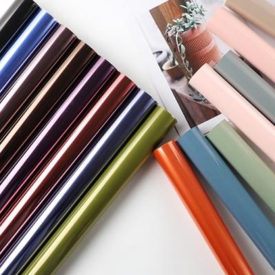 China New crystal paper flower wrapping paper, fresh color opp film, waterproof flower wrapping paper, transparent colored cellophane for sale