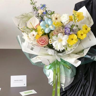 China Waterproof colored jelly film, flower art wrapping paper, semi-transparent cellophane, crystal paper, flower packaging material, glazed paper for sale