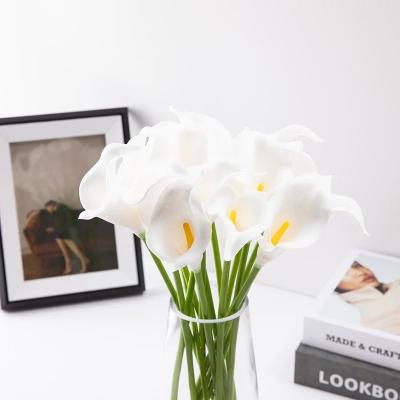 China High-end cream-style pu calla lily bouquet artificial flower home decoration living room dining table counter shopping mall table decoration for sale