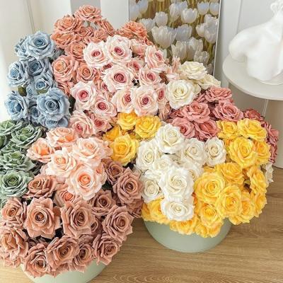 China Simulated Flower 7-Head Cappuccino Silk Flower Simulated Rose Bundle Rose Wedding Fake Flower Decoration Flower Simulated Fake Flower for sale