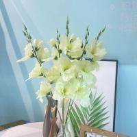 China Simulated flower small single sword orchid fake flower cross-border hot selling floral bouquet high-end silk flower small orchid table flower arrangement for sale