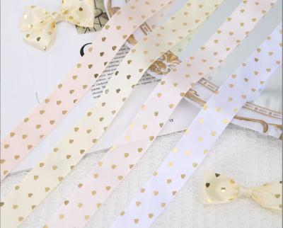 China 2.5cm Valentine's Day Hot Stamped Love Ribbon Ribbon Flower Bouquet Gift Packaging Ribbon Handheld Flower Shop for sale