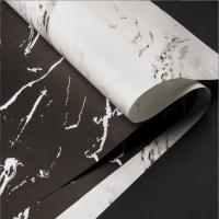China Black marble-patterned flower wrapping paper packaging material, flower shop supplies flower wrapping paper gift wrapping paper fruit wrapping paper for sale