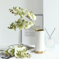 China A fresh and elegant 3D printed 7-head film Phalaenopsis artificial flower, light luxury home living room and dining table floral arrangement artificial flower for sale